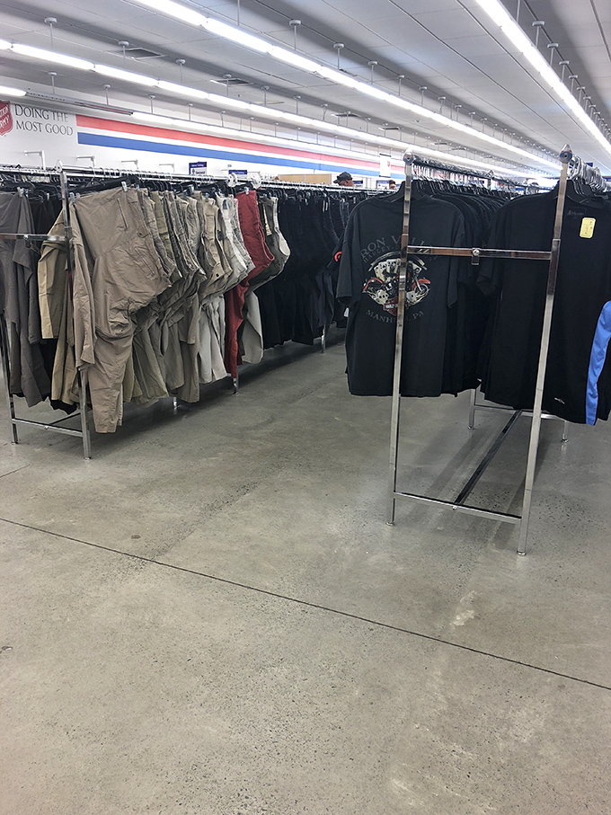 The men's department offers everything from casual wear to interview-ready blazers, all meticulously organized by type and size for efficient treasure hunting.