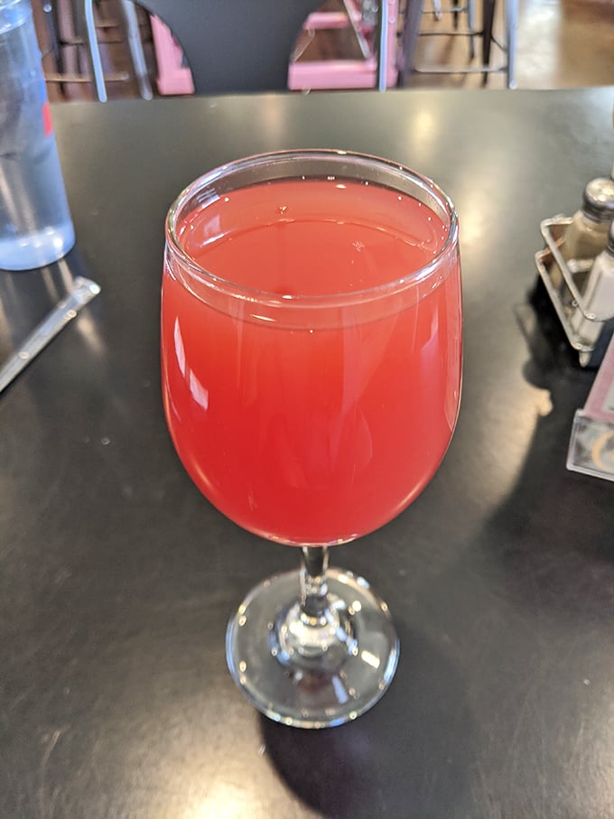 This isn't just a mimosa—it's sunrise in a glass, the kind of morning cocktail that makes you forget you're not on vacation.