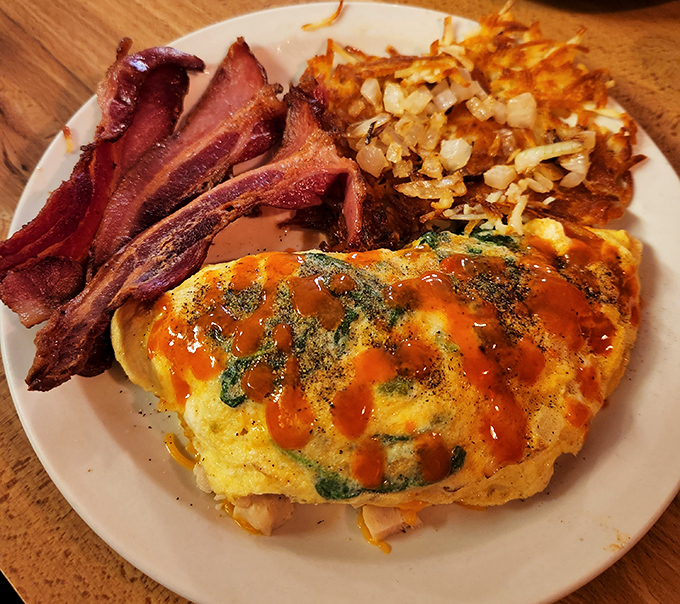 This omelet showcases the beautiful art of transforming simple eggs into something absolutely extraordinary and delicious.