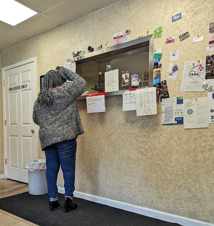 Where the magic happens. Those business cards on the wall? Think of them as barbecue love letters from satisfied customers.