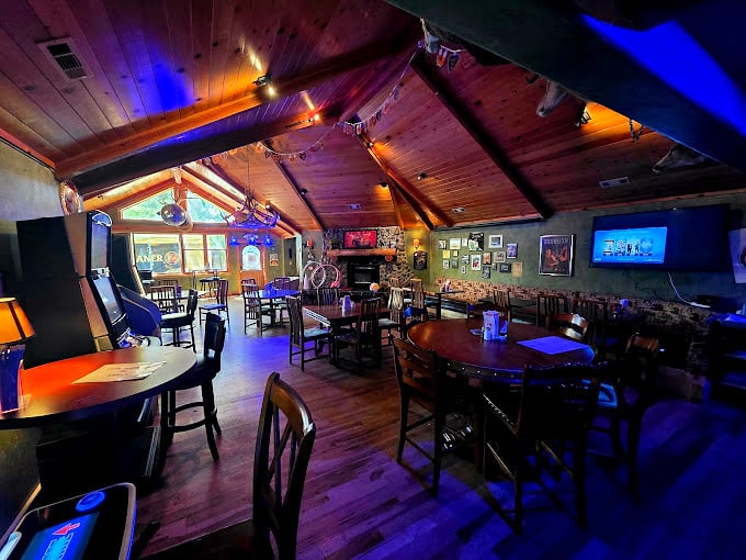 Rustic charm meets evening ambiance. Those wooden cathedral ceilings make every meal feel like a special occasion, even if it's just Tuesday. 