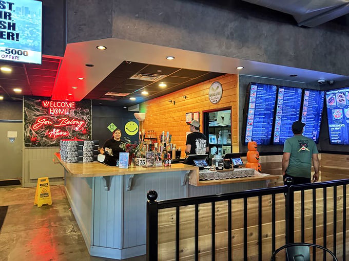 The ordering counter where BBQ dreams begin, complete with the neon promise that "You Belong Here"&mdash;and your stomach certainly agrees.