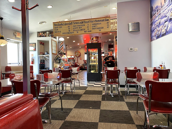 Red chairs, checkered floors, and display cases full of temptation&mdash;the diner aesthetic that never goes out of style.