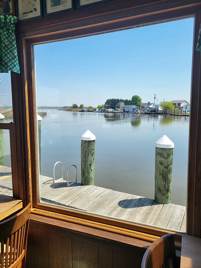 The million-dollar view that no amount of fancy restaurant design could improve. This window frames the working waterway that delivers your dinner daily.