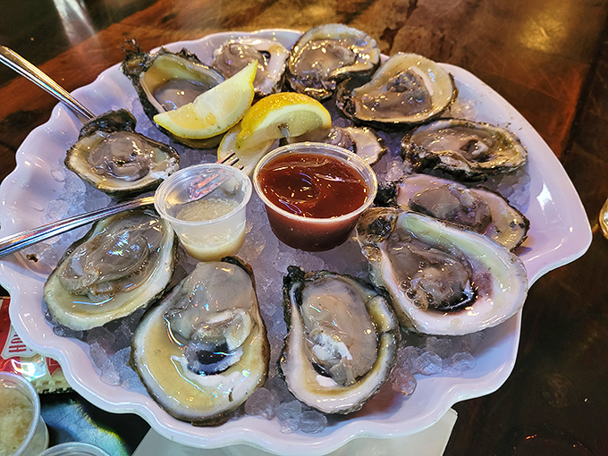 Oysters on the half shell, glistening like jewels on ice. Nature's perfect appetizer with just a hint of the ocean in every slurp.