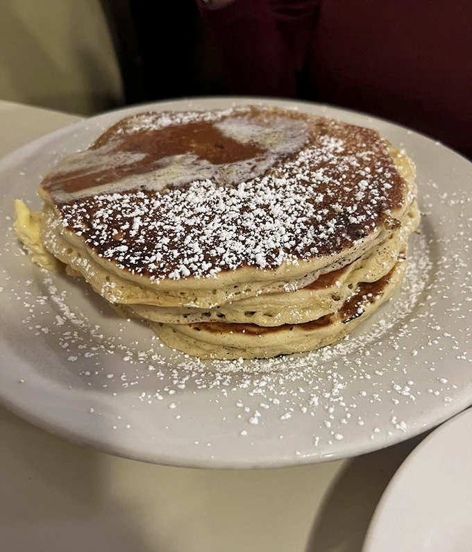 Pancakes so perfectly golden and dusted with powdered sugar, they make you question why we don't eat breakfast for every meal.