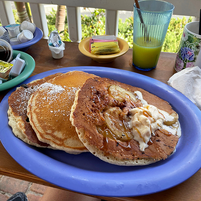 Pancakes so fluffy they could double as pillows. That melting butter and syrup combo is the breakfast equivalent of a warm hug.