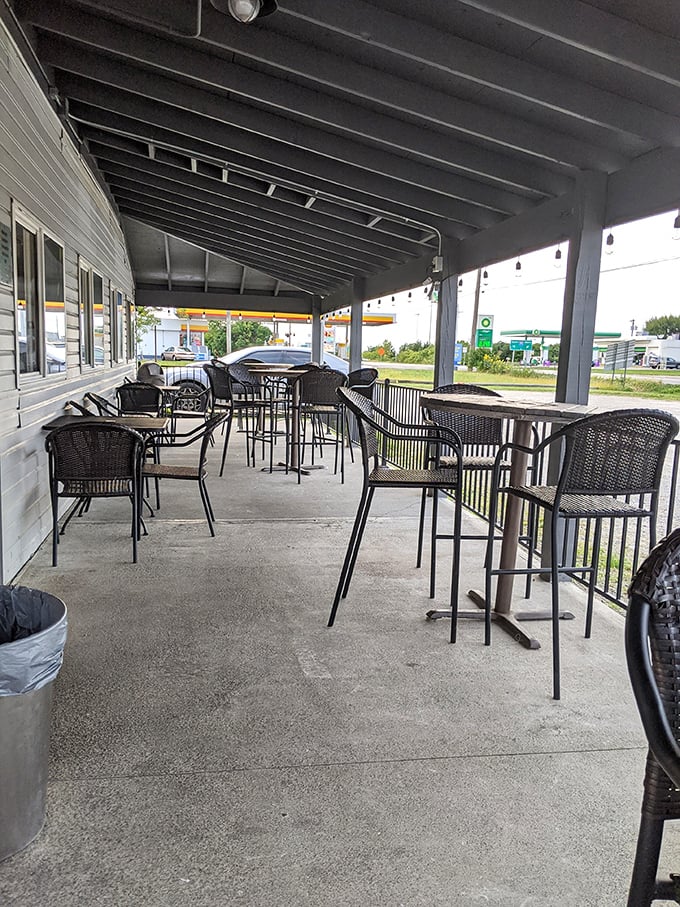 The covered patio offers al fresco dining with high-top tables&mdash;perfect for summer evenings when eating indoors feels like a crime.