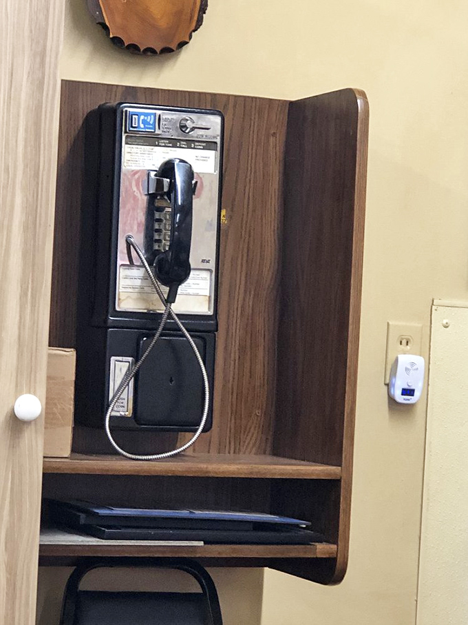 The payphone booth&mdash;a charming relic from when "texting" meant passing notes in class. Some traditions are worth preserving.