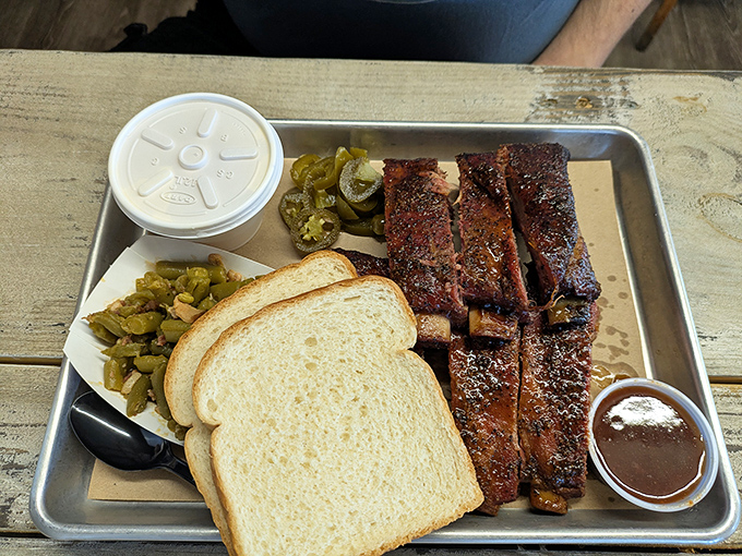 A tray that answers life's most important question: "Why choose?" Ribs, green beans, white bread, and pickles &ndash; the four food groups of Texas happiness.