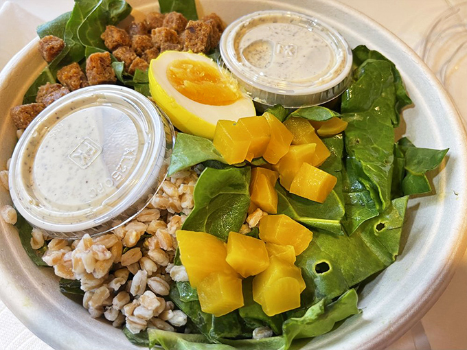 Even the salads mean business here, with fresh greens playing host to a party of flavors that would make a carnivore consider conversion.