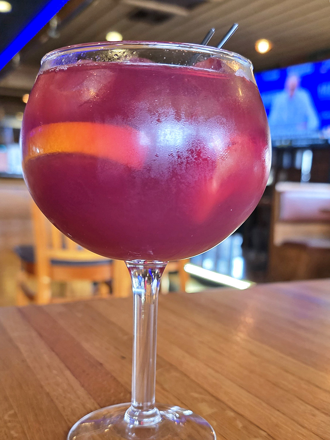 This isn't just a sangria; it's a sunset in a glass. Fruity, refreshing, and exactly what you want while contemplating a second order of crab legs.