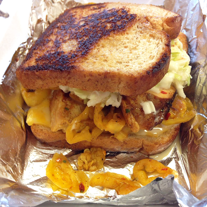 This sandwich isn't just lunch&mdash;it's architecture. Layers of smoky meat, melted cheese, and toasted bread create the Taj Mahal of handheld meals.