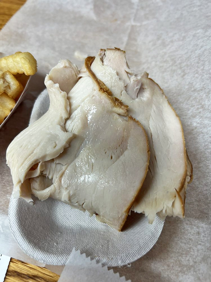 Turkey that's undergone a smoke transformation, proving Lexington's mastery extends beyond pork.