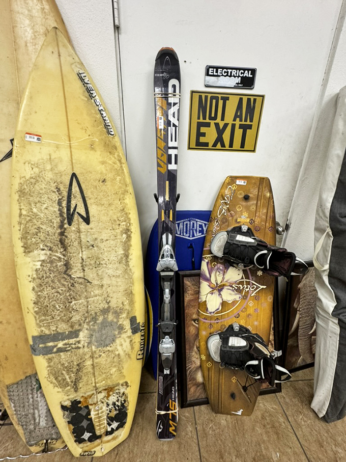 Surf's up! Beach gear and winter sports equipment coexist in California harmony, ready for your next outdoor escapade.