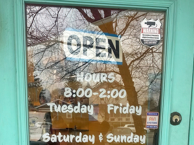 Hours posted like a promise: "Yes, we'll be here when you need us." The breakfast equivalent of a friend who never lets you down.