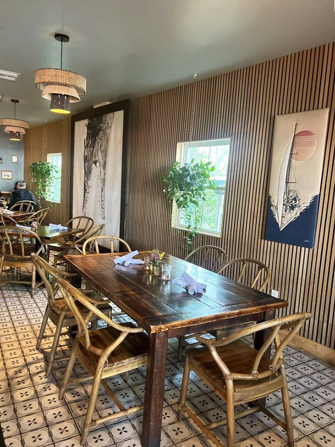 The communal table invites strangers to become friends&mdash;a dining philosophy as warm and inviting as the wooden surfaces themselves.