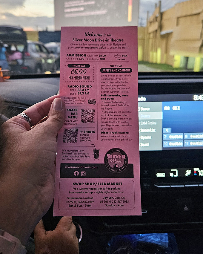 Pink ticket in hand, radio frequencies noted—your passport to an evening under the stars with Hollywood as your guide.