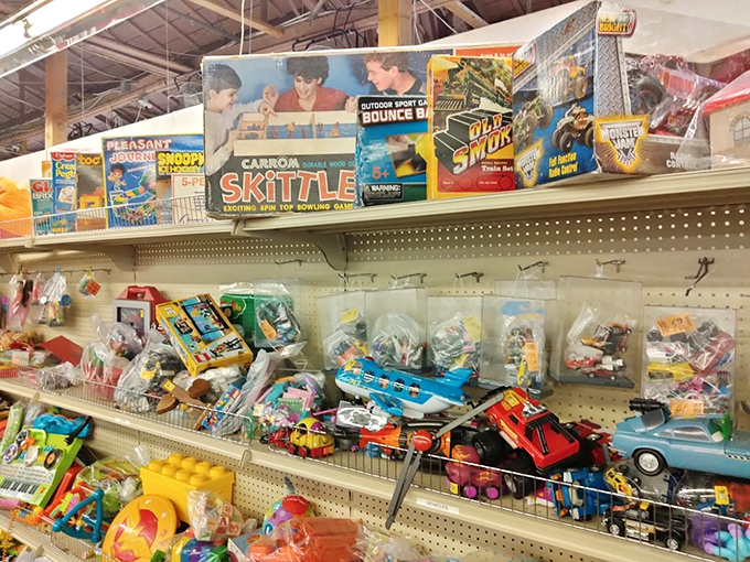 Vintage board games, colorful toys, and childhood treasures create a time capsule that makes adults linger longer than they'd planned.