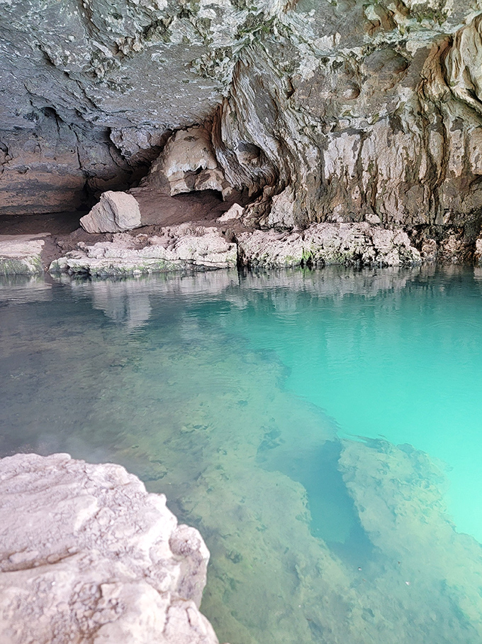 The turquoise waters inside the cave system look like something from a fantasy movie, yet they're real and waiting beneath Missouri's rugged landscape.