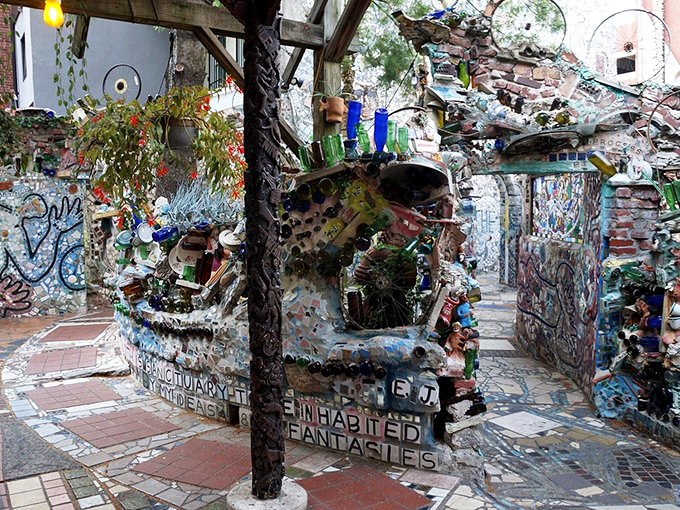 The building's exterior is like the world's most ambitious community art project, where even bicycle wheels find their second calling.