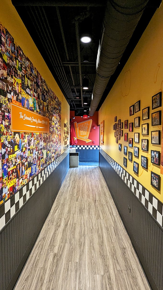 The hallway to happiness, lined with photos of satisfied customers. It's like a yellow brick road, but it leads to pastrami instead of Oz.