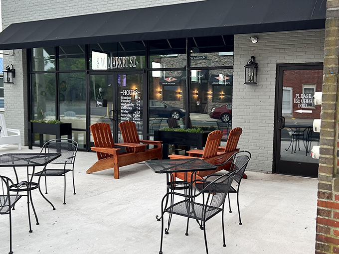 Amity Coffee Roasters' crisp white exterior with black accents offers a modern coffee oasis in historic Greenwood.