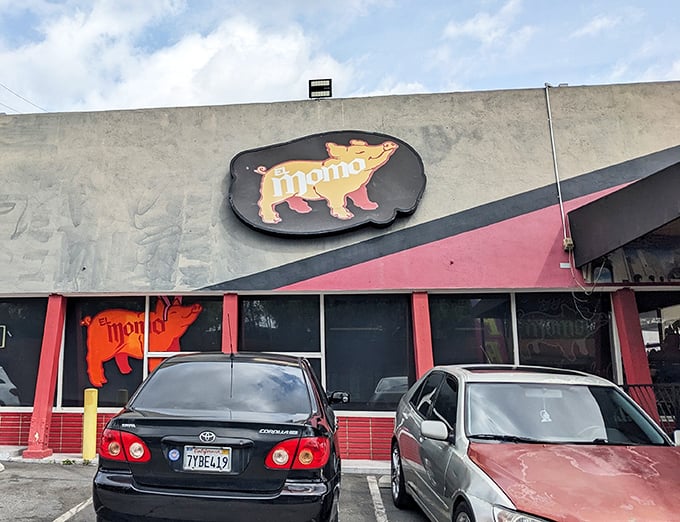 El Momo's understated exterior and distinctive pig logo tell carnitas connoisseurs they've found their happy place. Don't judge this taco temple by its cover!