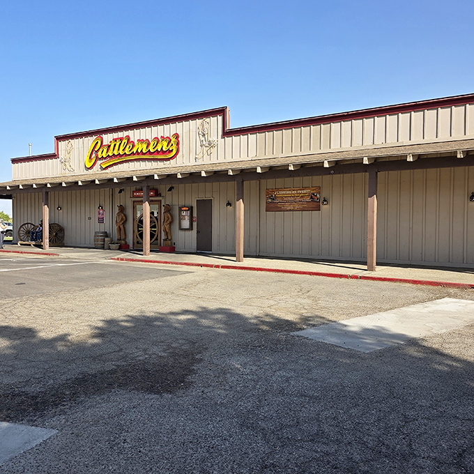 Another Cattlemen's outpost spreading the gospel of good beef. That neon boot sign is like a bat signal for hungry cowboys!