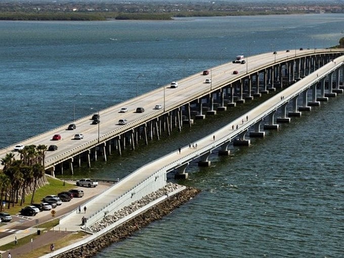 The Courtney Campbell Causeway stretches across Tampa Bay like a concrete ribbon tying together two coastal gems.