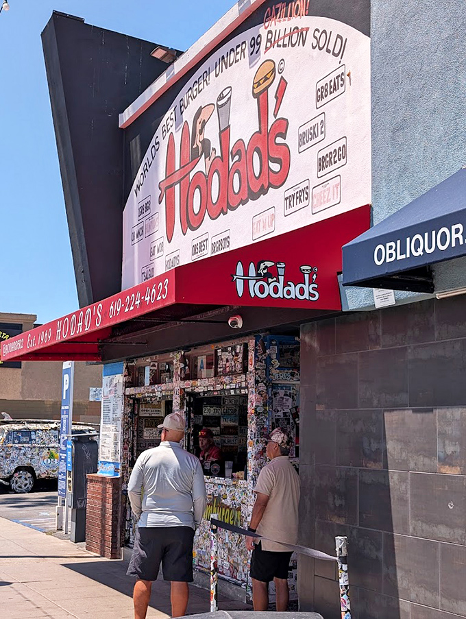 Hodad's wall of stickers and memorabilia isn't decoration &ndash; it's a visual history of burger pilgrims who came before you.