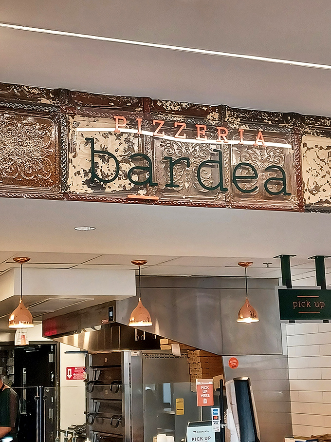 Bardea's sleek sign signals this isn't your ordinary pizza joint. Modern design outside, culinary innovation inside.