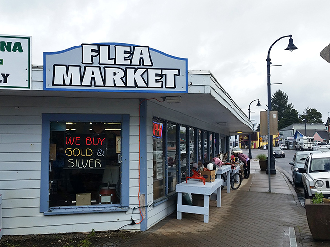 Coastal charm meets bargain hunting at Waldport's blue-trimmed treasure trove by the sea.