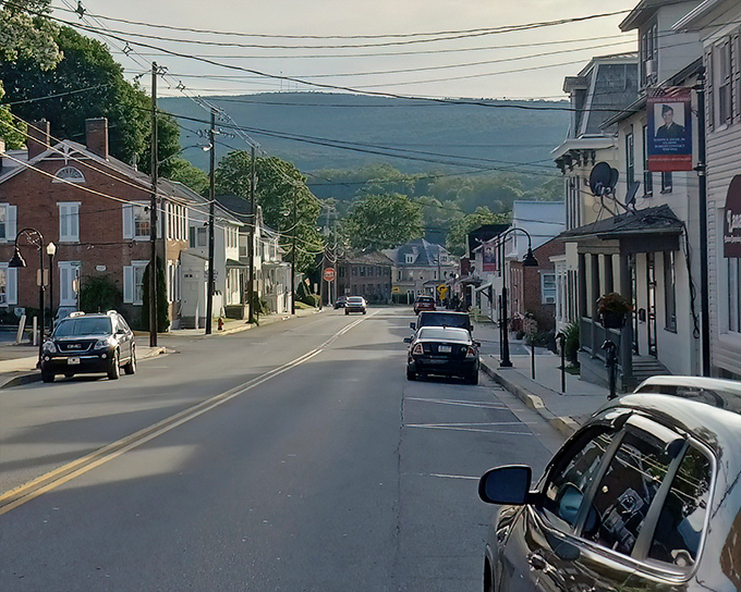 The historic church in Bedford stands as a community landmark, its red brick and white steeple visible from miles away.