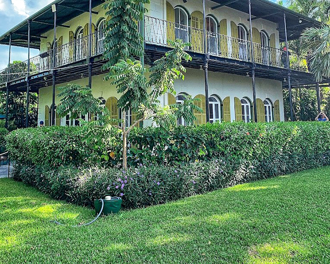 Lush gardens surround this literary landmark where six-toed cats still rule the roost as they did in Papa's day.