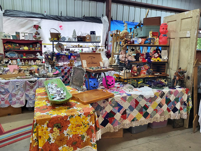 Vintage quilts and collectibles await at this charming stall. Grandma would approve of these handcrafted treasures!