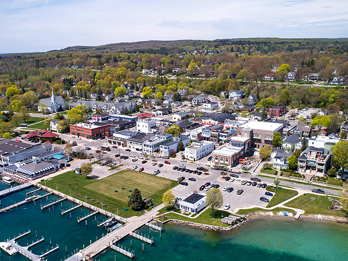 The aerial view of Harbor Springs reveals a town nestled perfectly between green hills and blue waters &ndash; Mother Nature's perfect composition.