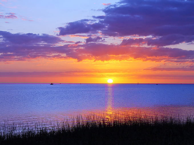 Nature's light show as the sun bids farewell &ndash; the kind of sunset that makes even bad photographers look good.