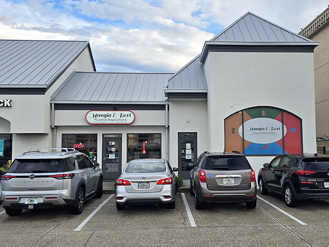 Mangia & Bevi's simple facade hides Neapolitan pizza perfection. The cars filling that parking lot know what the uninitiated don't yet realize.