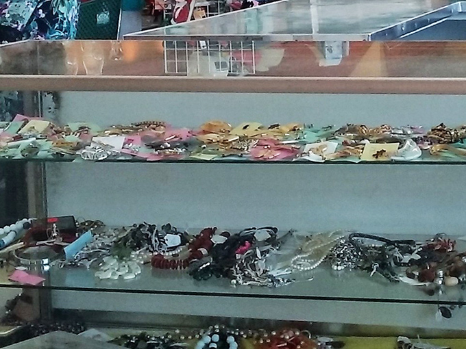 Glass cases filled with jewelry and accessories where hidden gems await the discerning treasure hunter's eye.