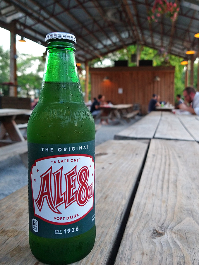 The cult-favorite Ale-8-One, Kentucky's beloved ginger-citrus soda, providing the perfect counterpoint to all that smoky, savory goodness.