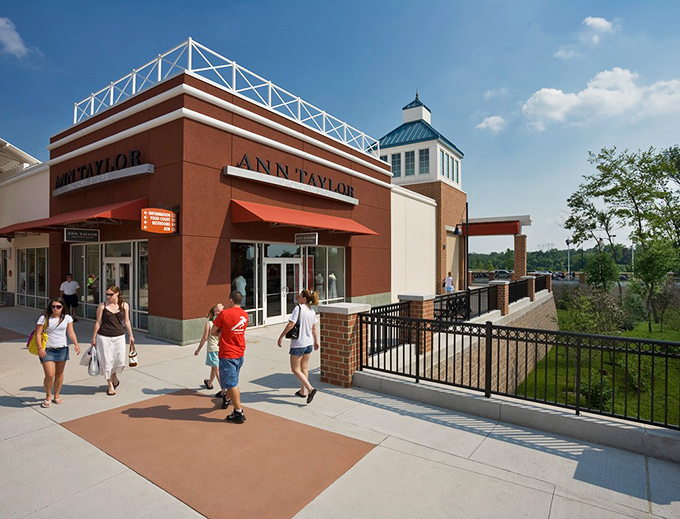 Ann Taylor welcomes shoppers with its distinctive architecture and signature awnings. Inside lies a treasure trove of workwear that means business about savings.