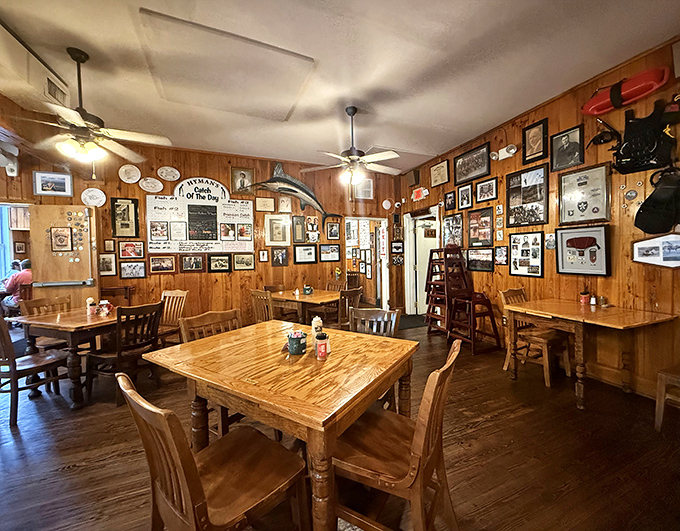 Every inch of wall space tells a story, creating an atmosphere that's equal parts maritime museum and beloved family kitchen.