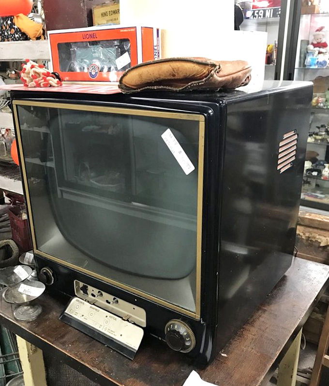 Before streaming and flat screens, families gathered around television cabinets like this&mdash;furniture first, entertainment center second.