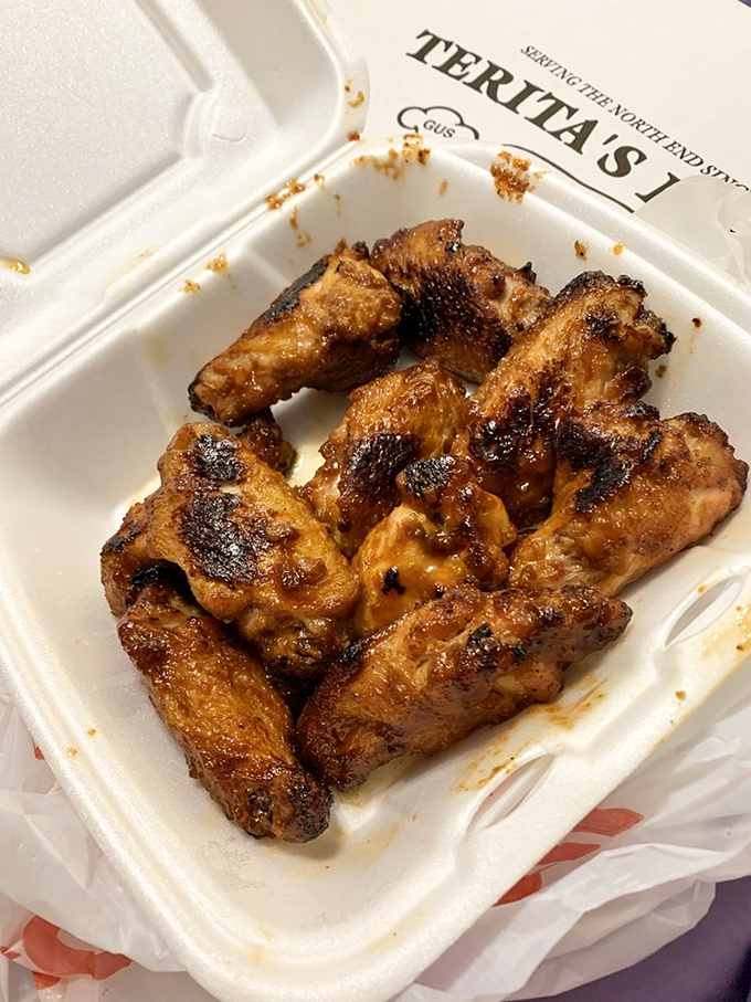 These wings aren't just cooked—they're transformed into glistening, caramelized flavor bombs that make you forget napkins exist for a reason.