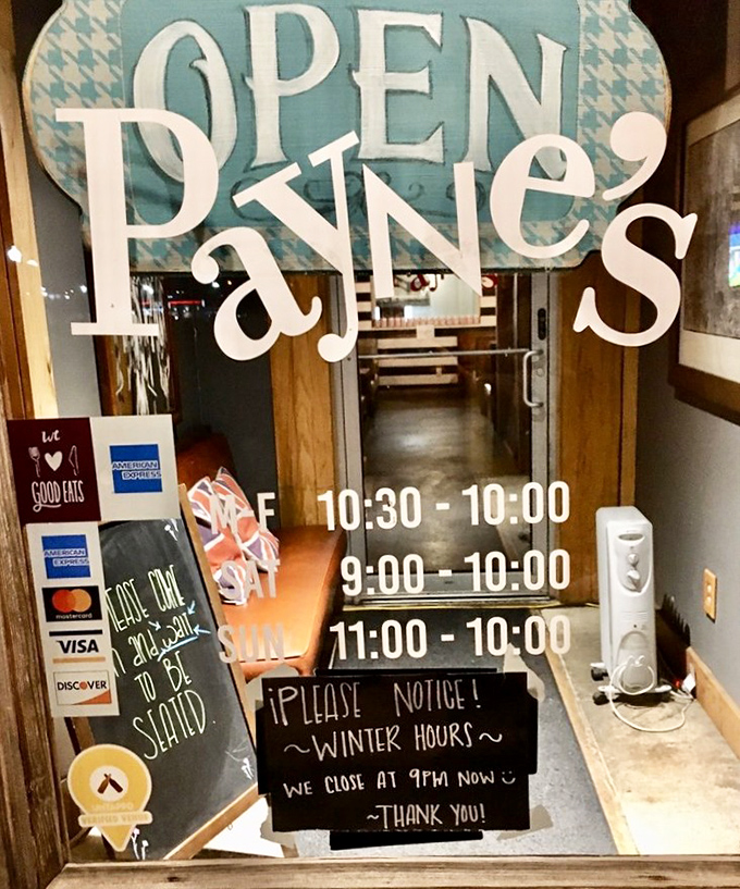 The door sign reveals Payne's generous hours, with a friendly winter update that feels like a neighbor's note rather than corporate policy.