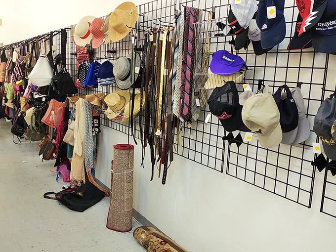 The accessories wall: where forgotten fedoras, vintage purses, and ties from business meetings past await their second chance at fashion glory.