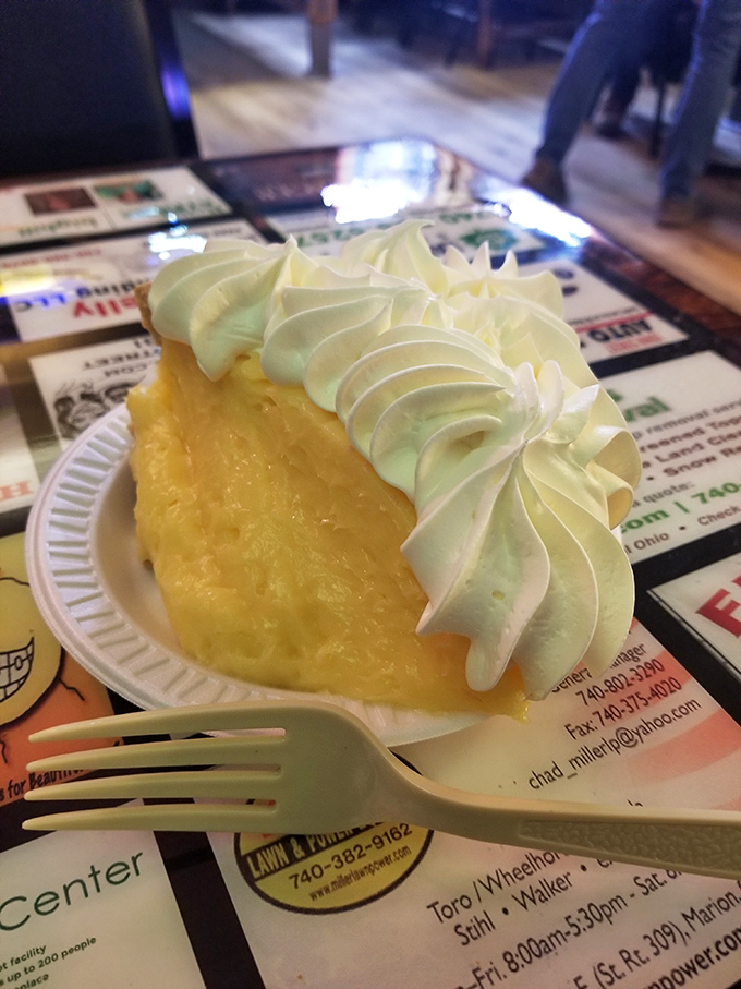 Banana cream pie so bright it could guide ships to shore. That whipped cream mountain deserves its own national park designation.