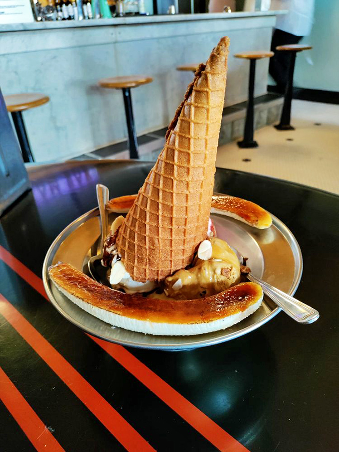 When your dessert needs a hat this magnificent, you know you're in for something special. That br&ucirc;l&eacute;ed banana is the cherry on top.