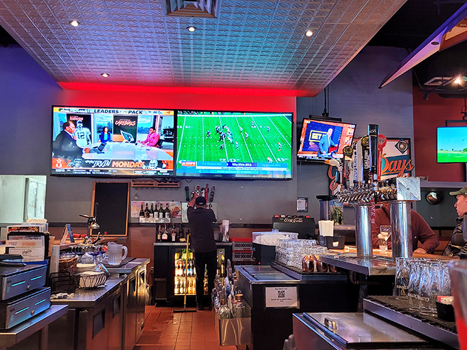 The bar: where strangers become friends and friends become family. The glow of screens above, the promise of cold drinks below.